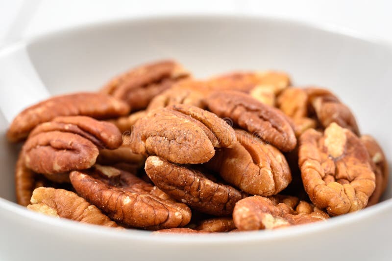 Pecan Nuts in White Bowl stock photo. Image of snack - 84531364