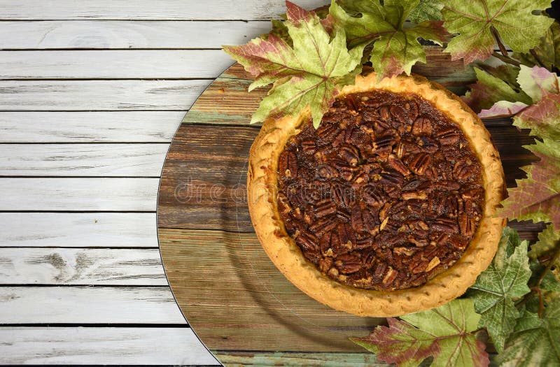 Pecan pie in fall leaves stock image. Image of plate - 77834619