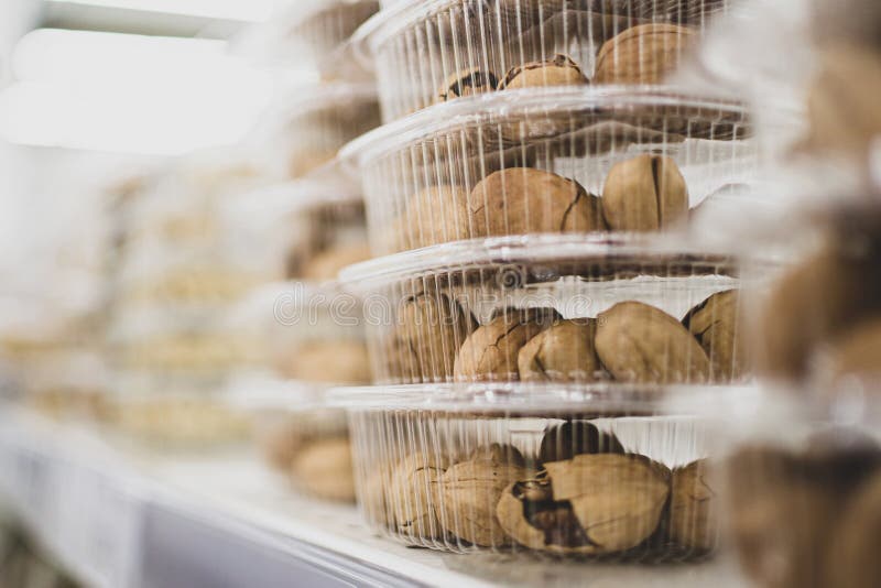 Pecans in Shells in Containers Stock Photo - Image of brown, grocery ...