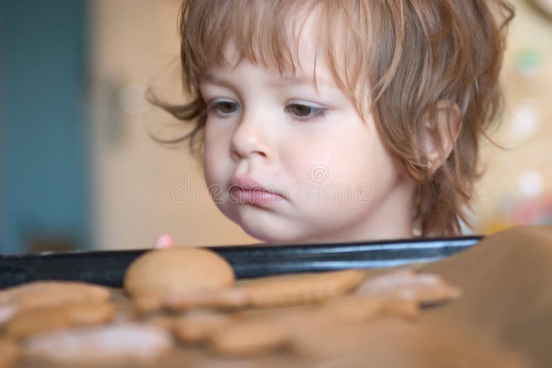 Peckish kid stock image. Image of looking, cakes, hair - 1465867