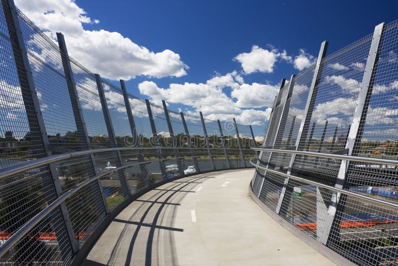 Pedestrian and Bicycle Bridge Stock Image - Image of traffic, building ...