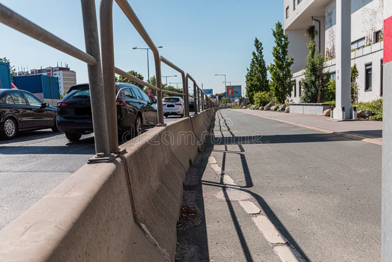 Pedestrian and Bicycle Paths are Fenced from the Roadway on a Sunny Day ...