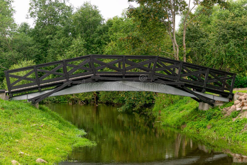 Pedestrian Bridge Across the Moat Near the Old Manor. Stock Image ...