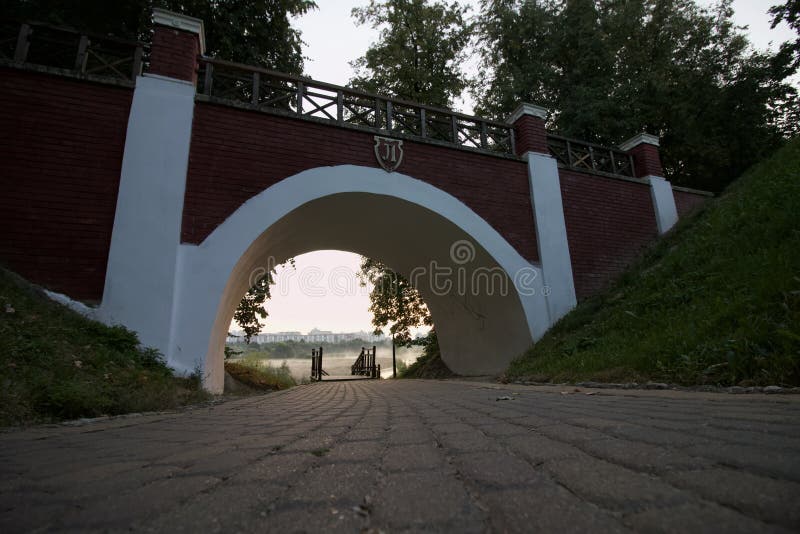 Pedestrian Bridge with an Arch in the City Park. the Camera Installed ...