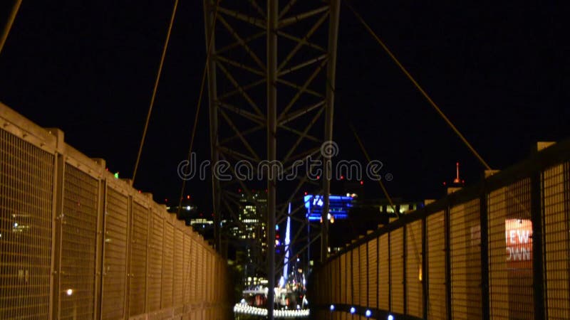 A Pedestrian Bridge Crossing a River in a Village Stock Footage - Video ...