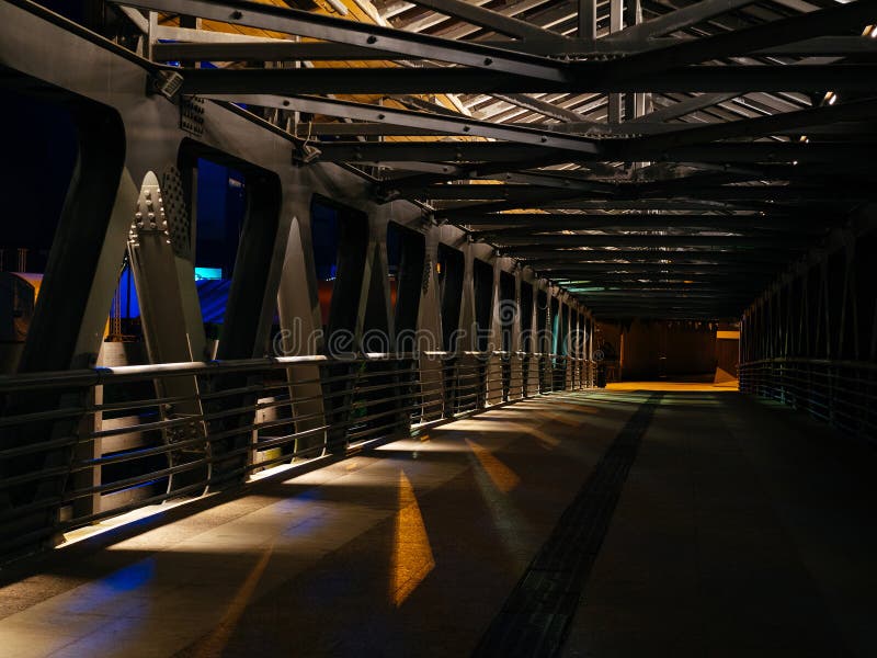 Pedestrian Bridge with Metal Structure at Night. Light and Shadow Stock ...