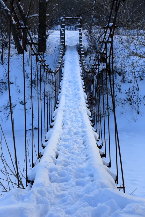 Pedestrian Bridge Over River in Winter Forest Stock Photo - Image of ...