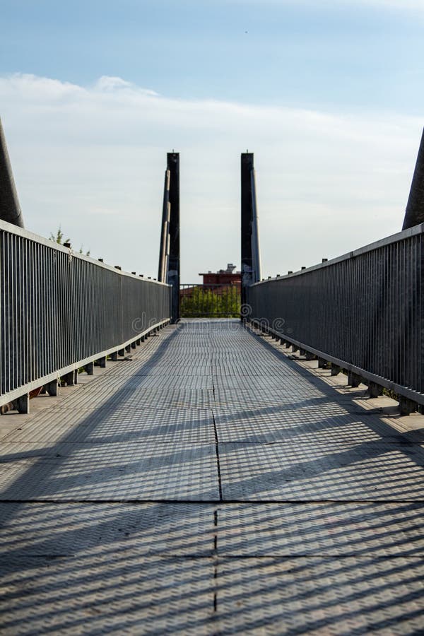 Pedestrian Bridge Over the Road on a Background of Blue Sky. Close-up ...