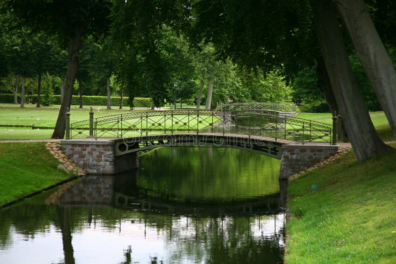 Pedestrian bridge in park stock image. Image of landscape - 17598971