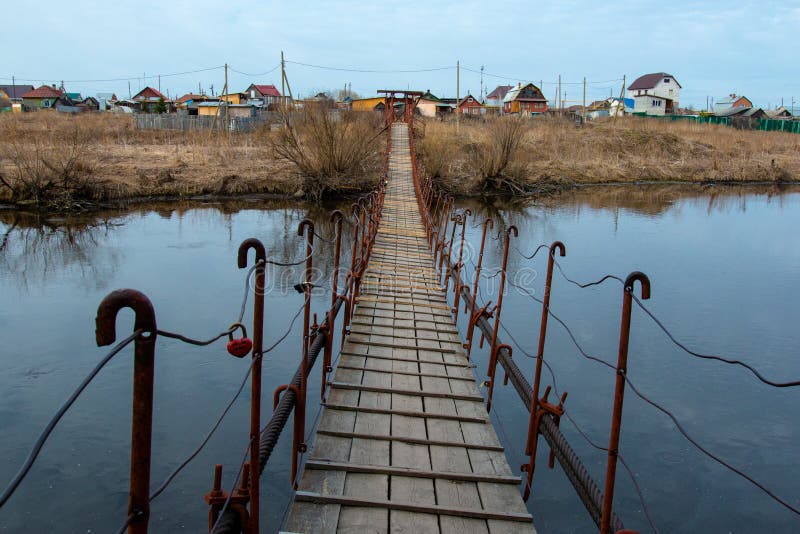 Pedestrian Bridge To Cross the River Stock Photo - Image of suspension ...