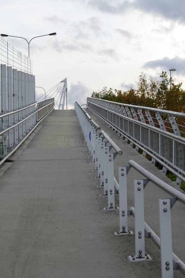 Pedestrian Bridge with White Railing Stock Image - Image of outdoors ...