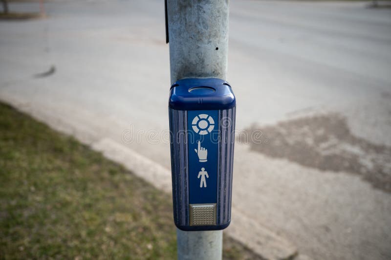 Pedestrian Crossing Button Mounted on a Metal Pole beside a Road Stock ...