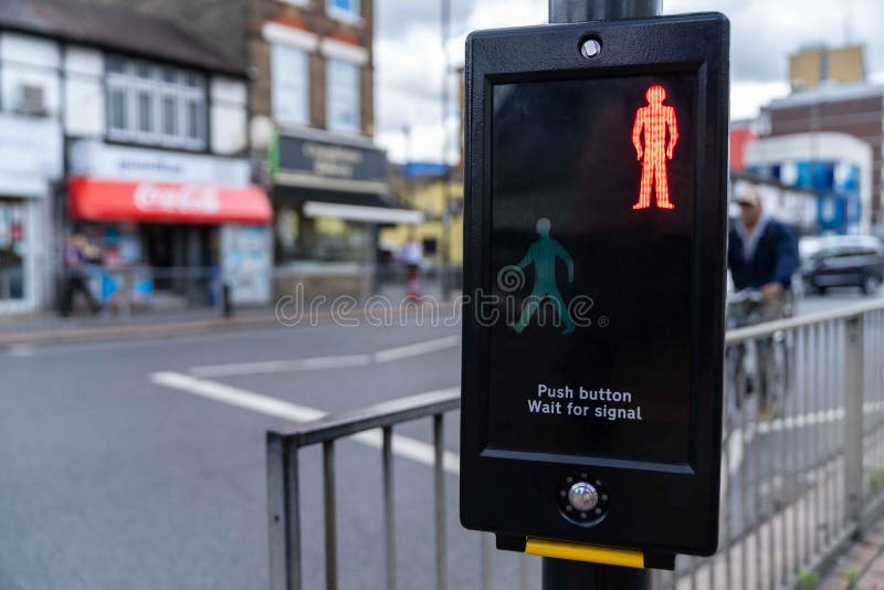 A Pedestrian Crossing Button and Stop Light Icon in London Editorial ...