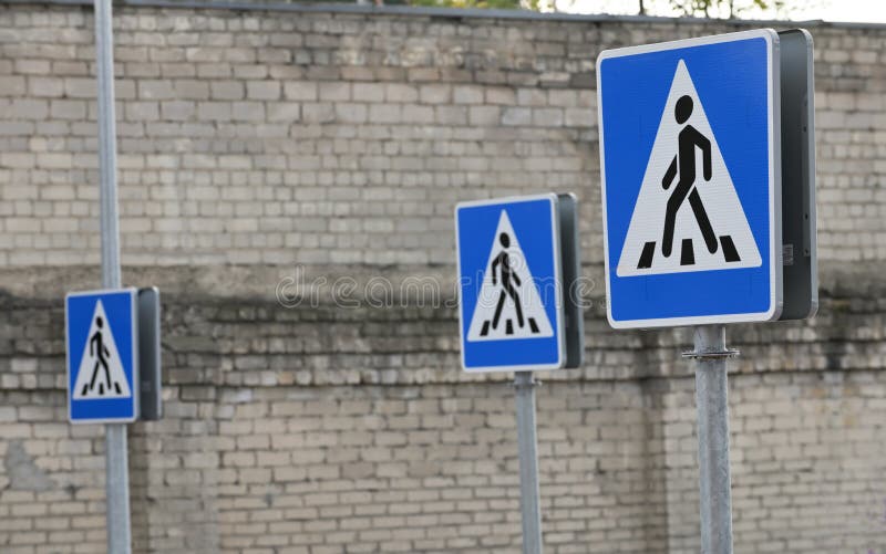 Pedestrian crossing signs stock photo. Image of attention - 229646982