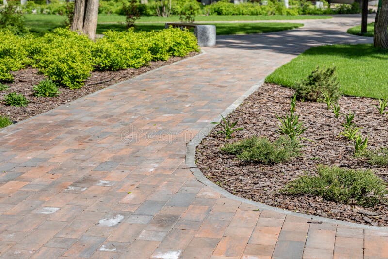 Pedestrian Paths, Lawns and Flower Beds, Mulching with Tree Bark ...