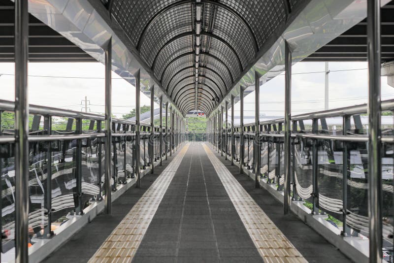 Pedestrian Pathway or Corridor or Hallway between Train Station and ...