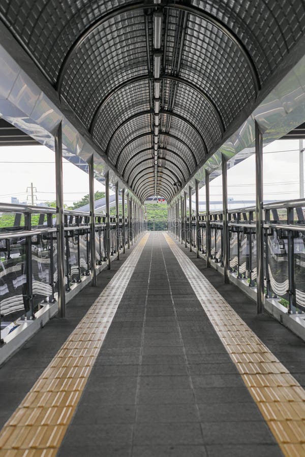 Pedestrian Pathway or Corridor or Hallway between Train Station and ...