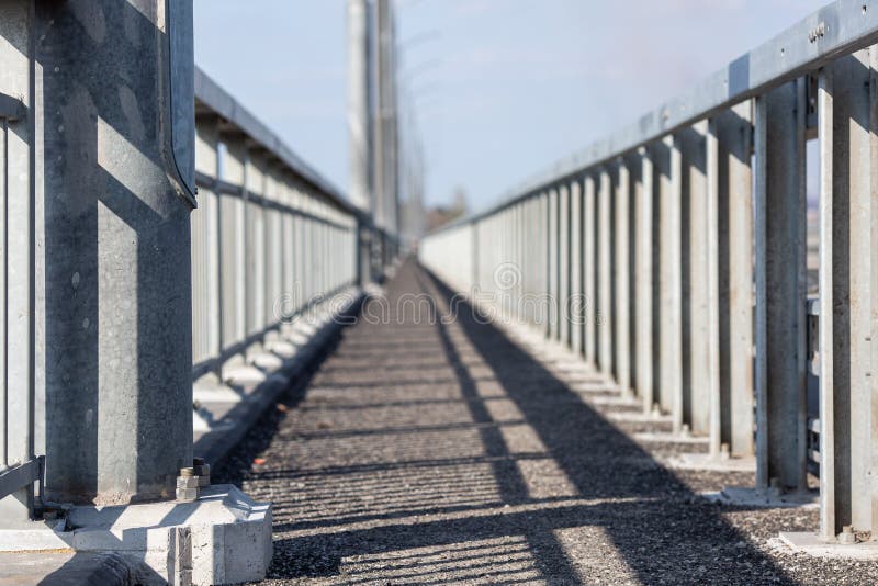 Pedestrian Pavement Safety Barrier on the Bridge. Sidewalk Perspective ...