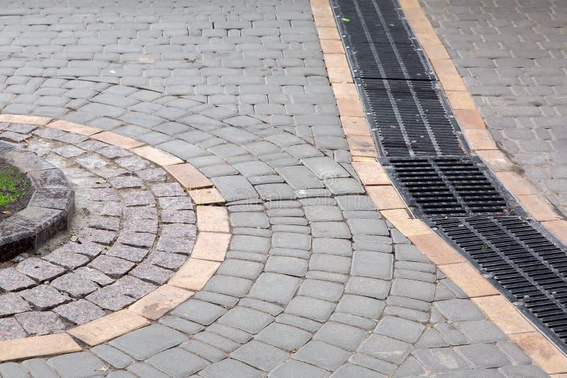 Pedestrian Square Made of Stone Tiles. Stock Photo - Image of grate ...