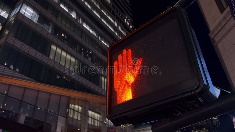 Pedestrian Traffic Light Hangs at an Intersection in New York. Red Stop ...