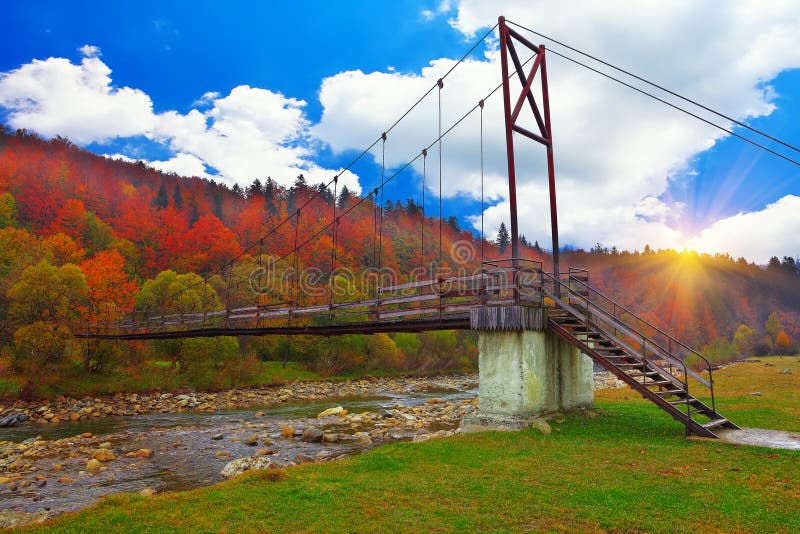 Pedestrian Wooden Bridge Over Mountain River Stock Image - Image of ...