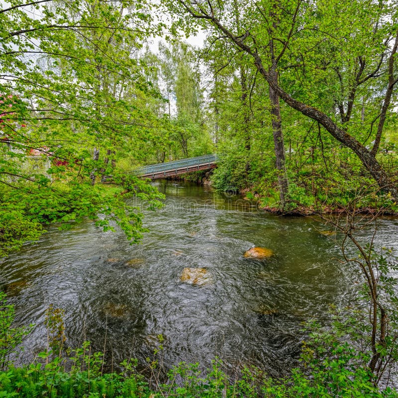Pedestrian Wooden Bridge Over Stream Stock Image - Image of wood ...