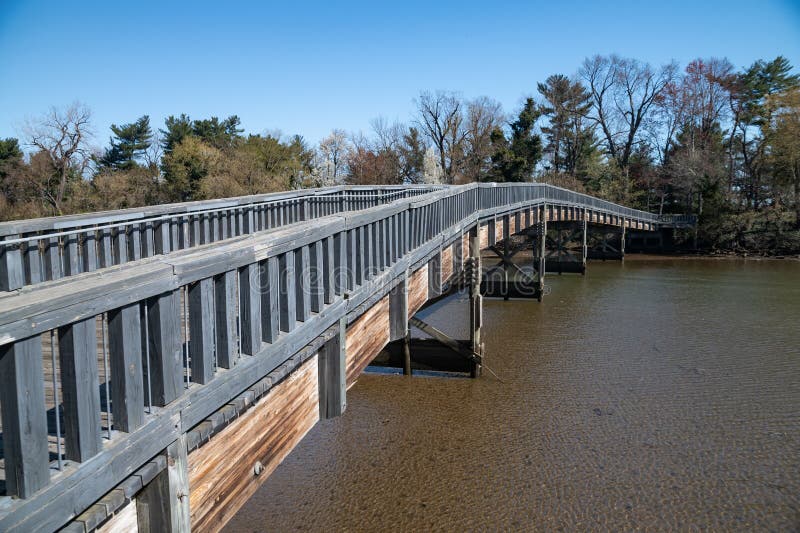 Pedestrian Wooden Bridge with Railings Over the River Stock Image ...