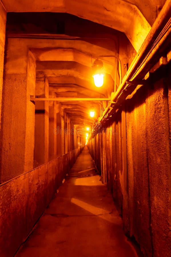 Pedestrian Zone of an Underground Tunnel Illuminated by Light Bulbs ...