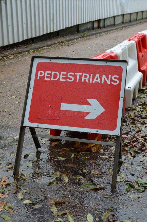 Pedestrians this way sign. stock image. Image of footpath - 45422083