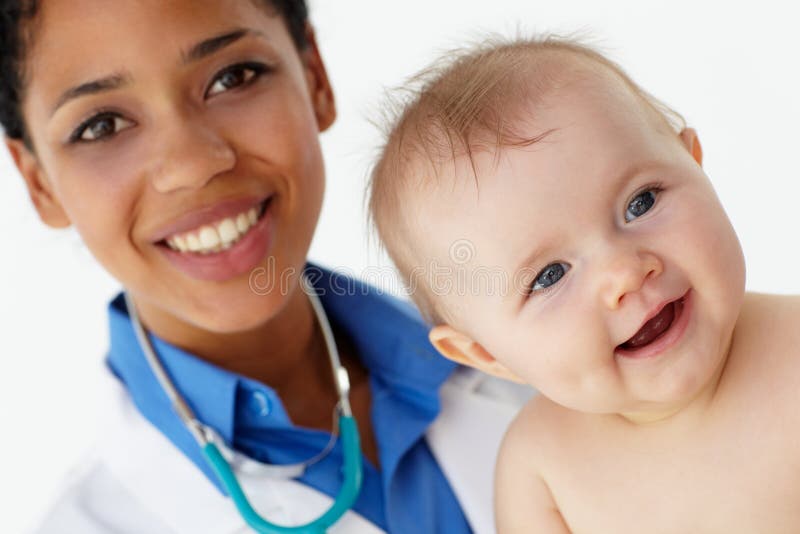 Pediatrician with baby stock image. Image of doctor, american - 19909169