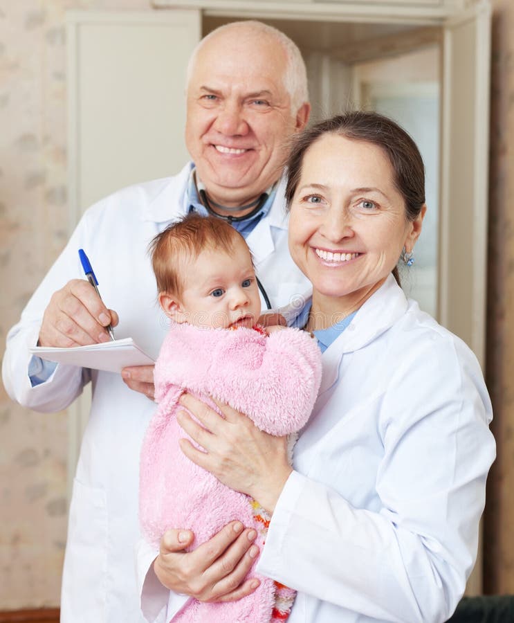 Pediatrician Doctors with Baby Stock Photo - Image of family, newborn ...