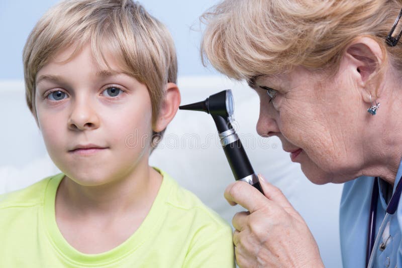 Examining Ear with Otoscope Stock Photo - Image of exam, otology: 32907956