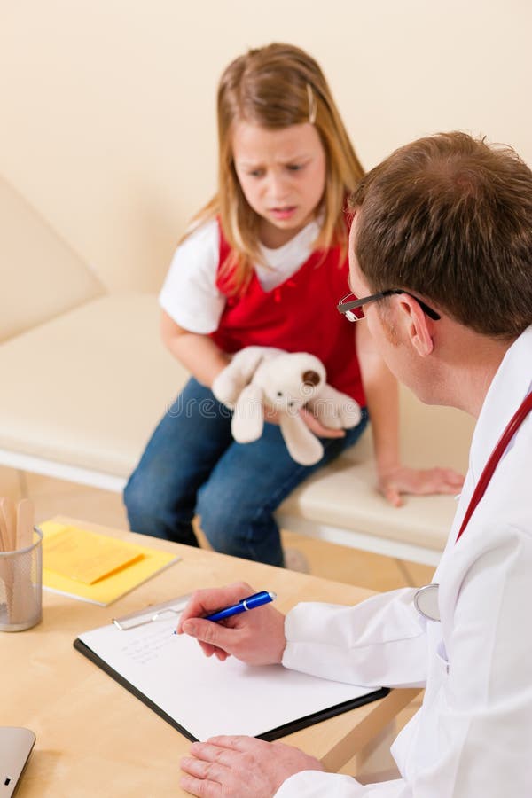 Pediatrician with Little Patient in His Surgery Stock Image - Image of ...