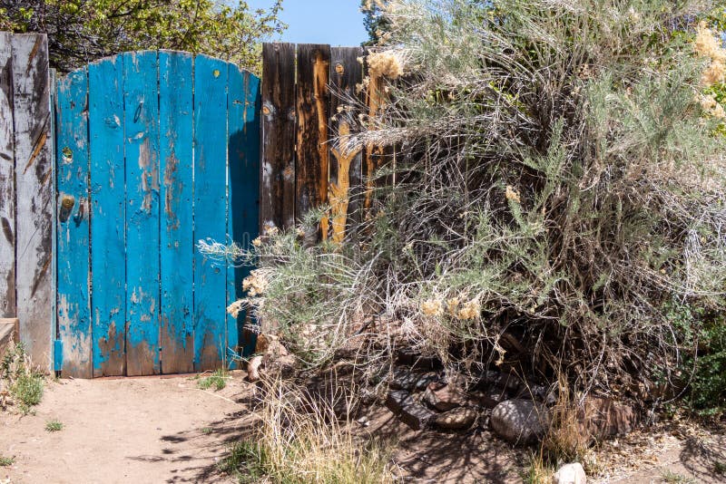 Weathered Painted Garden Gate in the Desert Stock Photo - Image of ...