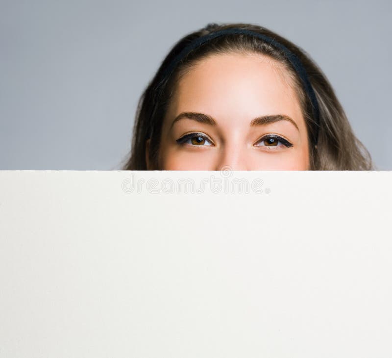 Peek a boo brunette. stock photo. Image of camera, brunette - 27791794