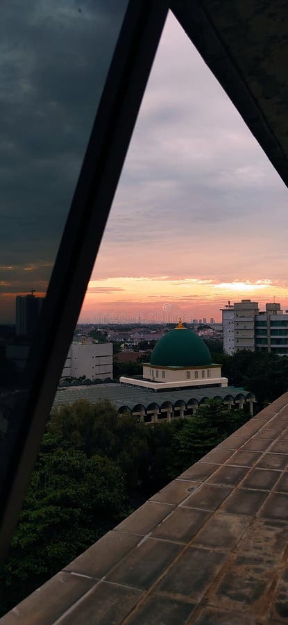 Peek at the Sunset from the Window Stock Image - Image of city, sunset ...