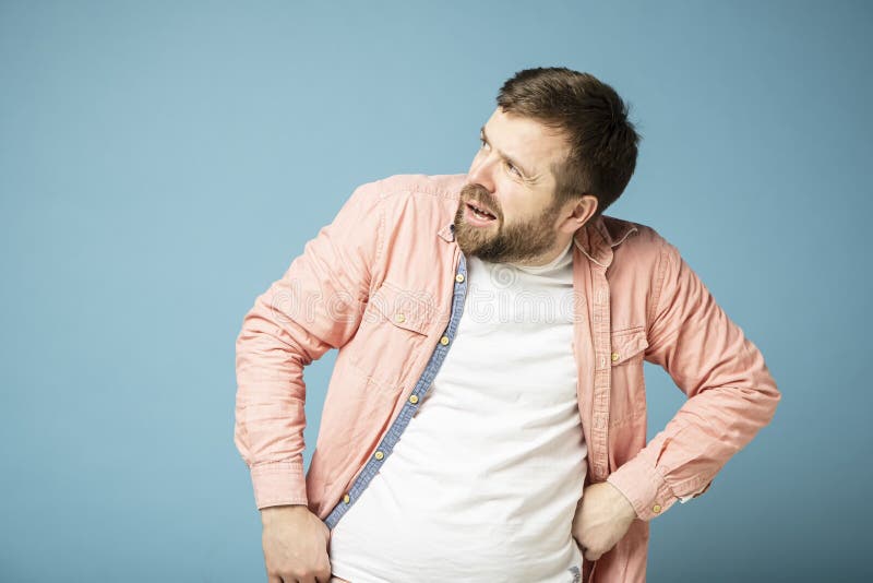 Peeking Bearded Man is Tracking Someone, Looking To the Side with a ...