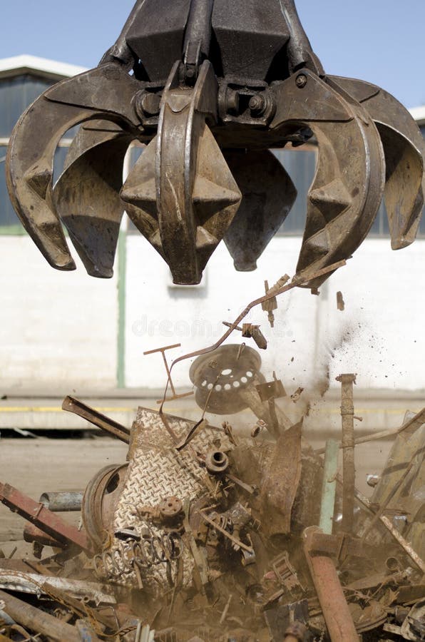Peel grab for scrap metal stock photo. Image of dump - 69653076