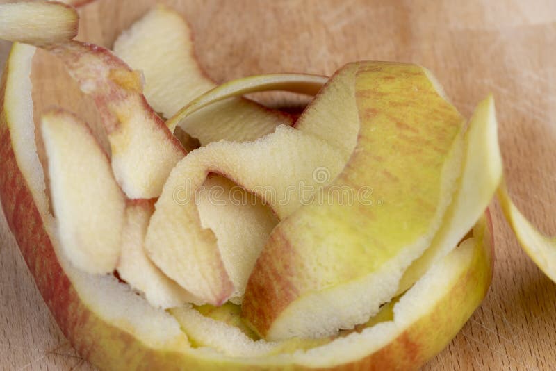 The Peel of a Peeled Apple Scattered on the Board Stock Photo - Image ...