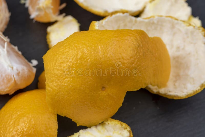 Peel of Ripe Peeled Tangerines Scattered on the Table Stock Photo ...
