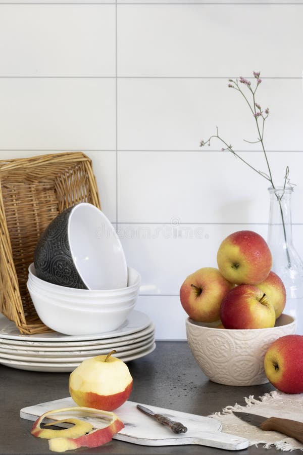 Peeled Apple and Utensils on Kitchen Table Stock Photo - Image of ...