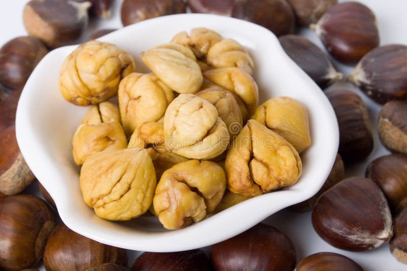 Peeled chestnut in a bowl stock photo. Image of chestnut - 12416766