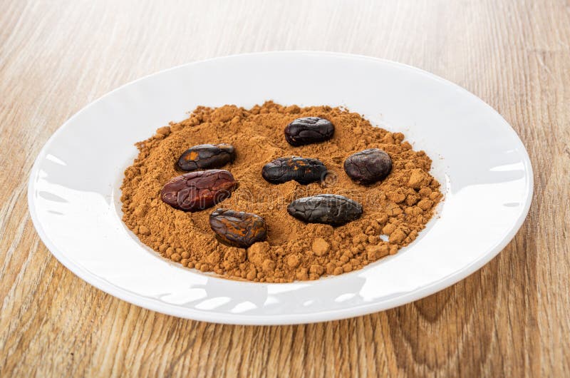 Peeled Cocoa Beans, Cocoa Powder in Plate on Table Stock Image - Image ...