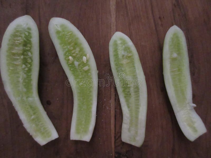 Peeled and Cut of Cucumber on the Board Stock Image - Image of food ...