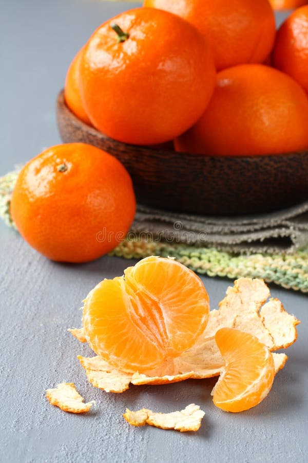 Peeled Fresh Mandarin with Bowl of Mandarins Stock Photo - Image of ...