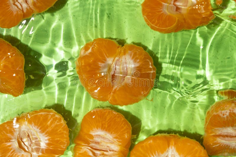 Peeled Fresh Mandarin Halves Water Splash Top View Stock Photos - Free ...
