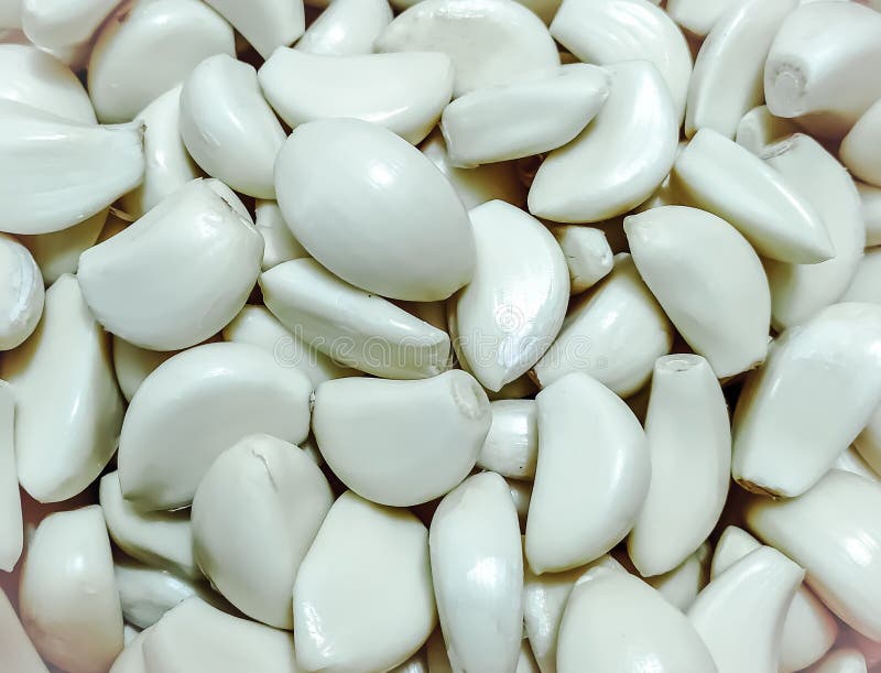 Fresh peeled garlic stock image. Image of healthy, marinate - 182449393