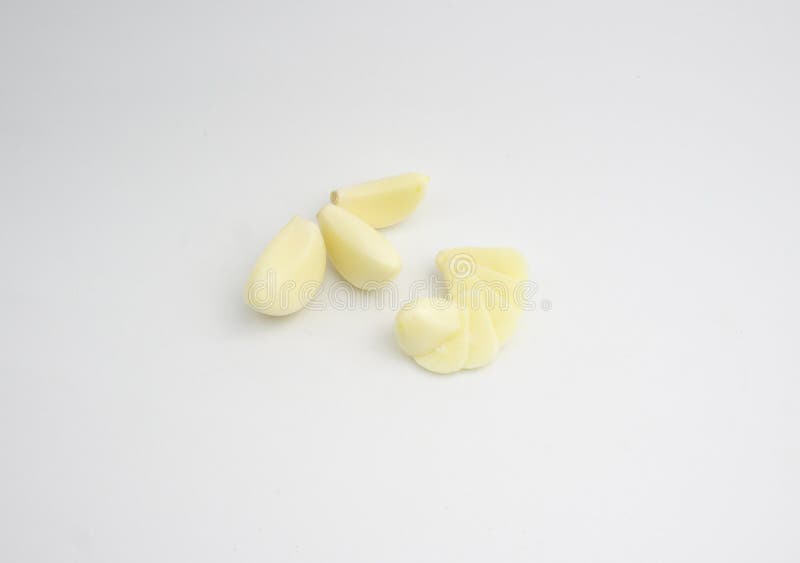 Peeled Garlic. Isolated on White Background Stock Photo - Image of ...