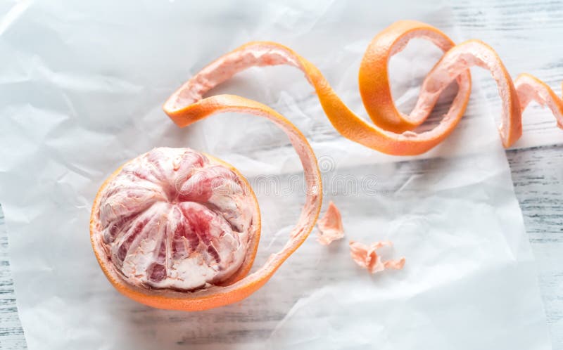 Peeled grapefruit close up stock photo. Image of round - 103553192