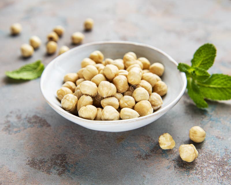 Peeled hazelnuts stock photo. Image of concrete, group - 215570844